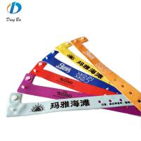 China Custom Logo Orange PVC Wristbands 250x25mm for Events Festival Disposable Waterproof for sale