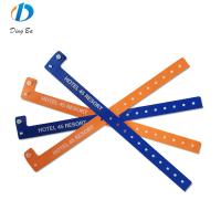 China Custom Logo Orange PVC Wristbands 250x25mm for Events Festival Disposable Waterproof for sale