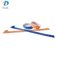 China Custom Logo Orange PVC Wristbands 250x25mm for Events Festival Disposable Waterproof for sale