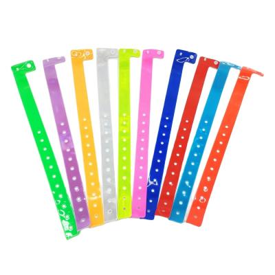 China Custom Neon Color PVC Reflective Wristband 250x25mm Waterproof Event Party Wristband for sale