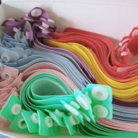 China Custom PVC Vinyl Wristbands 250x25mm Rainbow Colors Anti-Lost for Events Festivals for sale