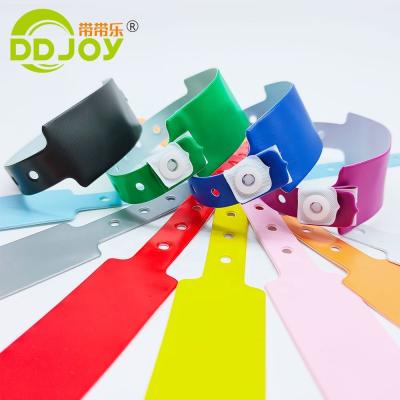 China Neon PVC Wristband 250x25mm Waterproof Adjustable Wrist Band for Events Festivals for sale
