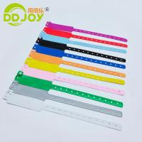 China Neon PVC Wristband 250x25mm Waterproof Adjustable Wrist Band for Events Festivals for sale