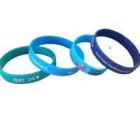 China Custom Silicone Wristbands 202x12x2mm Glow in Dark Rubber Bracelets for Events for sale
