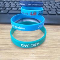 China Custom Silicone Wristbands 202x12x2mm Glow in Dark Rubber Bracelets for Events for sale