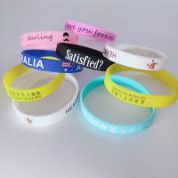 China Custom Silicone Wristband 202x12x2mm Glow in Dark Waterproof Orange Bracelet for sale
