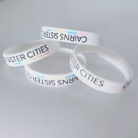China Custom Silicone Wristband 202x12x2mm Glow in Dark Waterproof Orange Bracelet for sale