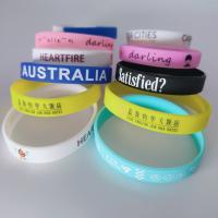 China Custom Silicone Wristband 202x12x2mm Glow in Dark Waterproof Orange Bracelet for sale