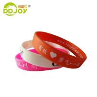 China Silicon Material Customized Logo Plastic Wristband for Non-Profit Organizations for sale