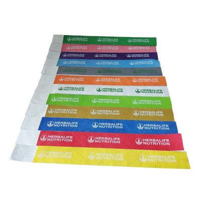 China Custom Red Tyvek Paper Wristbands 1 Inch 250x25mm for Events with Logo Printing for sale