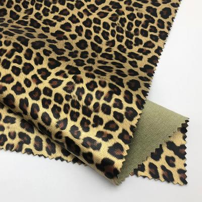 China 0.6mm Thickness Leopard Print PU Leather Material - Water Resistant & Wash-Free for Fashion Applications for sale