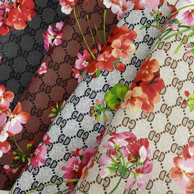 China Printed GD Letter Flower PVC Faux Leather Fabric for Bags Phone Cases Packaging 1.0mm for sale