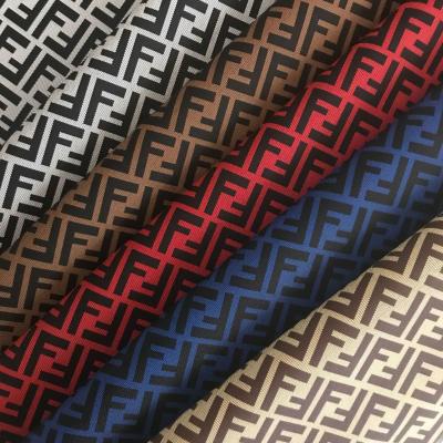 China Printed Double F Letter PVC Faux Leather Fabric 1.4mm Thick for Bags Purses Wallet Phone Case Gift Box for sale