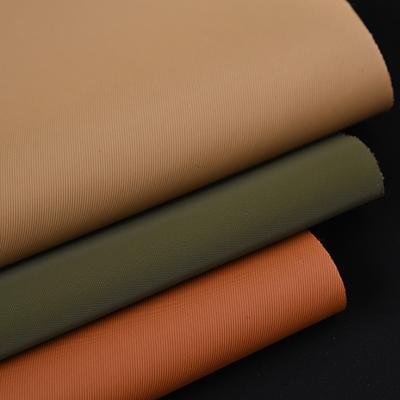 China Waterproof Semi-PU Leather with Nylon Texture and Brushed Bottom for Handbags 1.2mm for sale