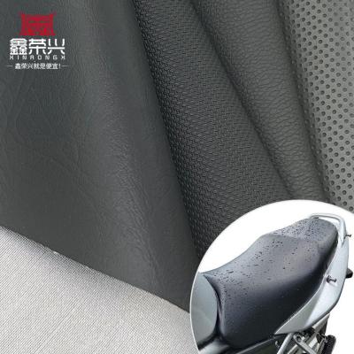 China Elastic PVC Embossed Synthetic Leather 0.6mm Thickness 140cm Width for Motorcycle Seat Covers and Furniture for sale