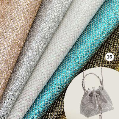 China Mesh-Type Coarse Glitter PVC Synthetic Leather 0.7mm 140cm Stretch Faux Leather for Shoes Bags Luggage Sofa Lining for sale