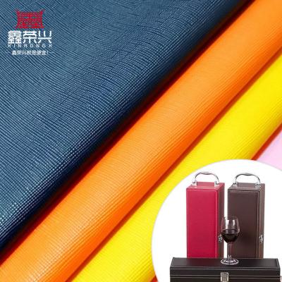 China 0.5mm Thickness 140cm Width PVC Cross Grain Artificial Leather for Furniture, Shoes & Automotive Applications for sale