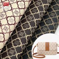 China PVC Four Leaf Clover Pattern Synthetic Leather Fabric 0.5mm Thickness 140cm Width for Bags and Packaging for sale