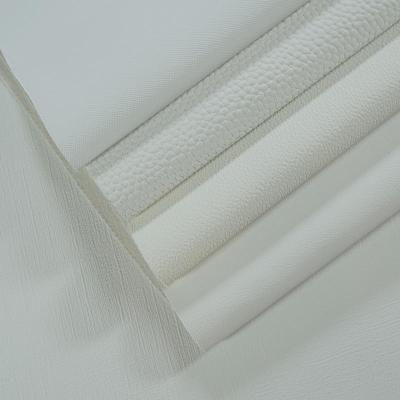 China PVC White Embossed Digital Printing Synthetic Artificial Leather 0.7mm 140cm for Bag Notebook Phone Shell Table Mat for sale