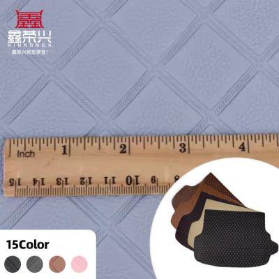 China PVC Rhombus Litchi Embossed Artificial Leather Fabric 1.1mm Thick 150cm Wide for Automotive and Furniture for sale