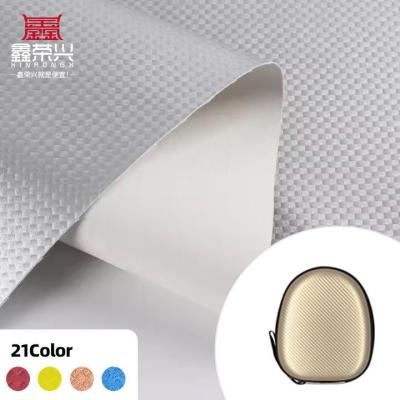 China Elastic PU Carbon Fiber Straw Mat Synthetic Leather 0.5mm 140cm for Bags Clothing for sale