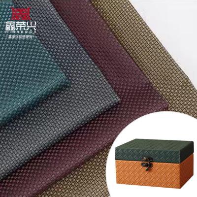 China PVC Woven Grain Artificial Synthetic Leather 0.65mm 140cm for Wall Packing Box Notebook Mat for sale