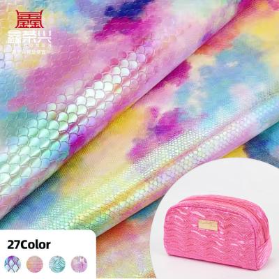 China PU Rainbow Mirror Embossed Synthetic Leather 0.9mm Thickness 137-140cm Width for Luggage and Bags for sale