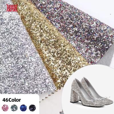 China Elastic PU Glitter Leather Fabric 1.2mm 140cm Wide Hexagon Embossed for Shoes Bags Crafts for sale