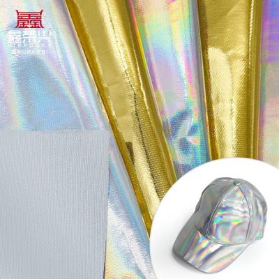 China PVC Holographic Laser Metallic Mirror Leather - 0.4mm Thickness, 140cm Width, Waterproof Synthetic Material for Upholstery for sale