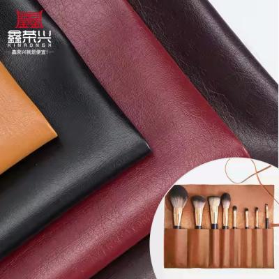China 0.7mm Thick 140cm Wide Knitted Backing PVC Leather Faux Fabric for Bags Sofa Furniture for sale