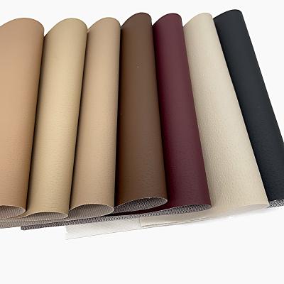 China PVC Perforated Pigskin Grain Faux Leather Fabric 0.6-1.4mm 137cm Width 7 Colors 50 Yards MOQ for sale