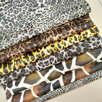 China Wholesale PVC Leopard Printed Synthetic Artificial Leather 0.8mm 140cm for Bag Notebook Phone Shell Table Mat for sale