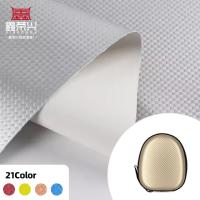 China Elastic PU Carbon Fiber Straw Mat Synthetic Leather 0.5mm 140cm for Clothing Bags Accessories for sale