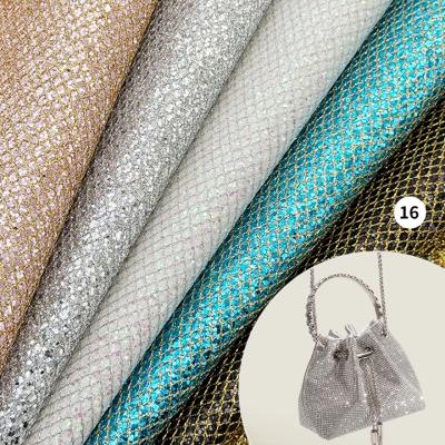 China Mesh-Type Coarse Glitter PVC Synthetic Leather 0.7mm 140cm Stretch Faux Leather for Shoes Bags for sale