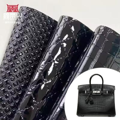 China High Gloss PVC Crocodile Embossed Synthetic Leather Fabric 0.8mm 137cm for Shoes Bags Decor for sale