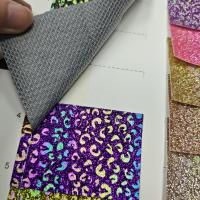 China Laser Iridescent Leopard Print Glitter Synthetic Leather 1.4mm Mesh Backed Faux Leather for Handbags Shoes DIY for sale
