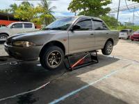 China 2500kg Electric Hydraulic Tilting Car Lift Mobile Quick Jack for Auto Repair for sale