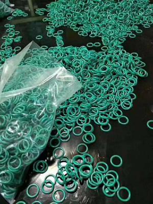 China Green NBR/FKM/FFKM Material Rubber O Rings OEM/ODM Compression Molding with Good Oil Resistance 16-30 N/mm Tear Strength for sale