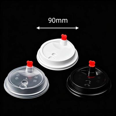 China Customized 90mm Matte Heart Shaped PP Cup Lids Spill Resistant for Beverage Packaging for sale