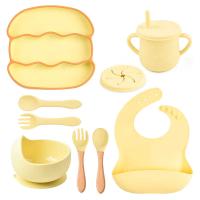 China Yellow Food Grade Silicone Bib And Bowl Set Eco BPA Free Silicone Feeding Set for sale