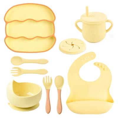 China Yellow Food Grade Silicone Bib And Bowl Set Eco BPA Free Silicone Feeding Set for sale