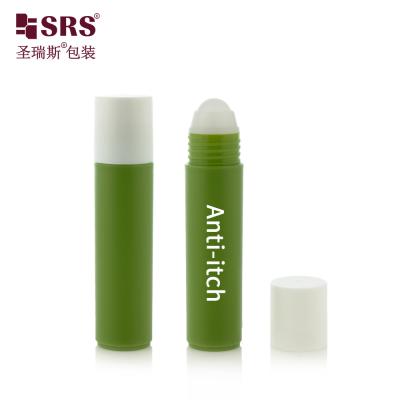 China Plastic Food Grade Material Empty Cosmetic Roll On Bottle 30ml Hair Serum With Massage Roll for sale