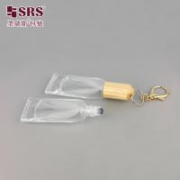 China GB3-10ML Empty Clear Glass Roll-On Bottle With Gemstone Ball Bamboo Cap With Hook for sale