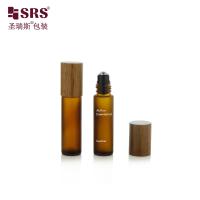 China BLPM-10ML Amber Frosted Glass Roller Steel Ball Essential Oil Bottle With Wooden Cap for sale