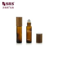 China BLPM-10ML Amber Frosted Glass Roller Steel Ball Essential Oil Bottle With Wooden Cap for sale