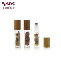 China BLPM-10ML Amber Frosted Glass Roller Steel Ball Essential Oil Bottle With Wooden Cap for sale