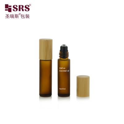 China BLPM 10ML Real Bamboo Cap Brown Glass Roll On Essential Oil Bottles for sale