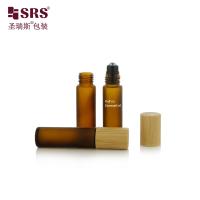 China BLPM 10ML Real Bamboo Cap Brown Glass Roll On Essential Oil Bottles for sale