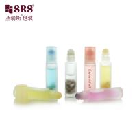 China 10ml Molded Glass Roll‑on Bottle Empty Essential Oil Roller Bottle Fitted With Gemstone Chips Cosmetic OEM Custom Logo for sale