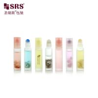 China 10ml Molded Glass Roll‑on Bottle Empty Essential Oil Roller Bottle Fitted With Gemstone Chips Cosmetic OEM Custom Logo for sale